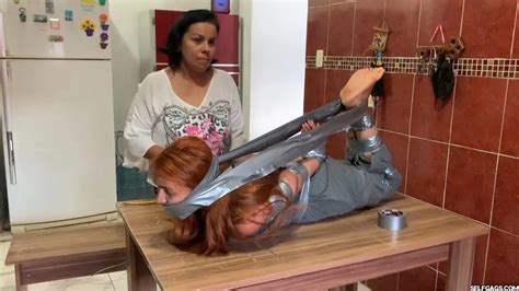 Hogtaped Student Lectured With Foot Whipping In Tape Bondage 30 Pics