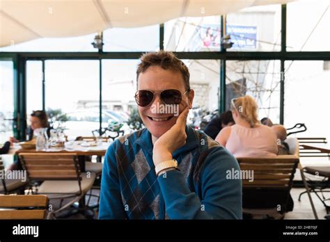 Portrait Of A 40 Year Old White Male Tourist With Sunglasses Stock