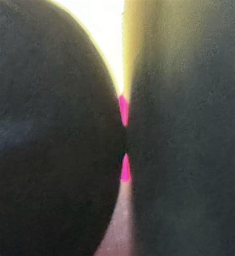 Why Do Objects Appear To Merge And Buldge Towards When They Are Touched