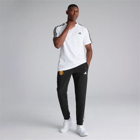 Buy Manchester United X Adidas Essentials Fleece 3 Stripes Tapered Cuff