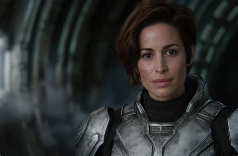 Serious Woman In Futuristic Armor Premium Ai Generated Image
