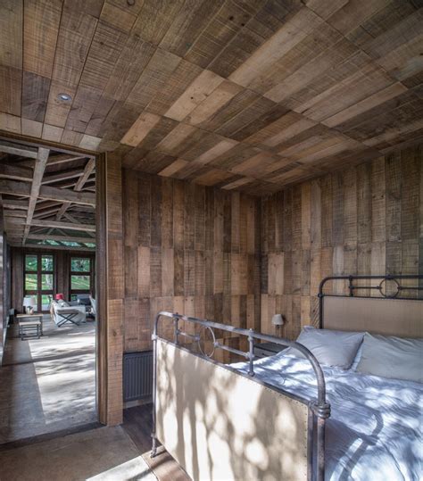 House On Lake Ranco Reuses Derelict Barns Roof And Timber