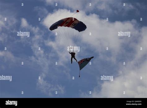 A Closeup Of An Raf Falcons Parachute Display Team Member Flying With A