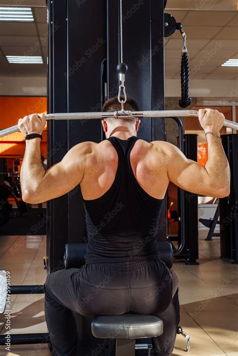 Shoulder Pull Down Machine Fitness Man Working Out Lat Pulldown