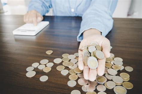 Premium Photo A Woman Makes Calculations Checks Her Finances Makes Notes In A Notebook