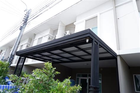 หลังคาไวนิลซ่อนรางน้ำฝนสแตนเลส กับงานหลังคาโรงรถสไตล์โมเดิร์น Wongguru