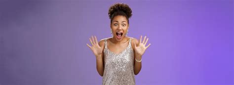 Free Photo Shocked Excited Charming Africanamerican Woman In Silver