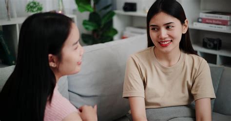 Handheld Selective Focus Shot Asian Female Couple Share Good Feelings