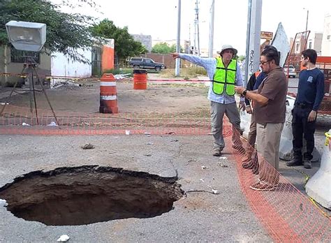 Man Missing After Falling Into Sinkhole And Getting Swept Away In Drain