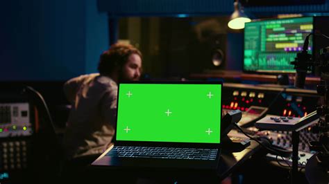 Sound Designer Uses Audio Mixer And Greenscreen Layout In Professional
