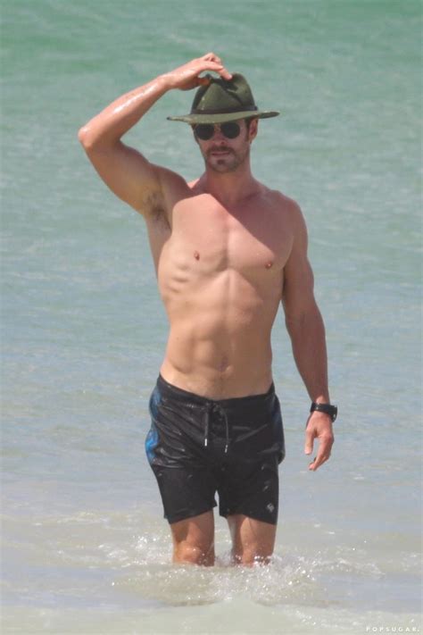 Chris Hemsworth Puts His Glistening Abs On Display In Australia And We
