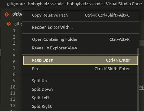 How to open a Tab in a new Window in Visual Studio Code | bobbyhadz