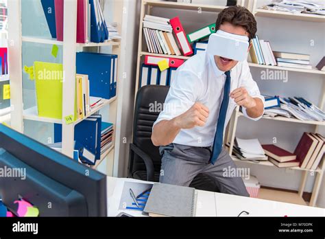 Employee Watching Movie On Vr Virtual Reality Glasses Stock Photo Alamy