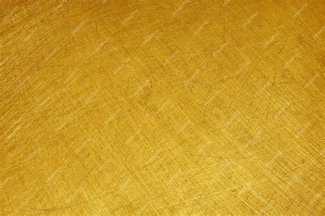 반짝이 옐로우 골드 알루미늄 금속 질감 배경 광택 스테인레스 스틸에 흠집 프리미엄 사진