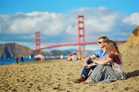 Baker Beach In San Francisco Relax At The Feet Of Serpentine Cliffs