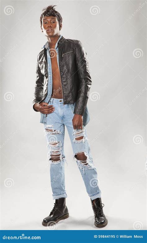 Attractive Man In Leather Jacket And Ripped Jeans Stock Image Image