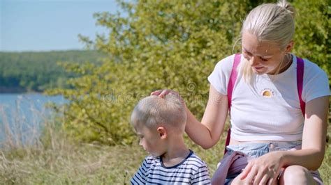 Mom Pats Her Son On The Head Stock Image Image Of Care Little
