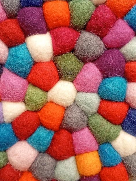 Premium Photo Colored Wool Textured Multicolor Yarn Balls Background