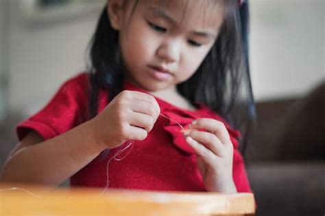 Premium Photo Cute Girl Doing Craft At Home