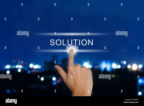Hand Clicking Solution Button On A Touch Screen Interface Stock Photo