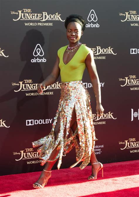 Lupita Nyongo And Brother At The Jungle Book Premiere Popsugar Celebrity