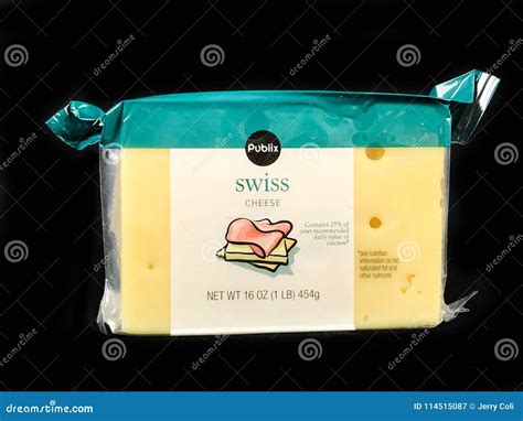 1 Pound Block Of Publix Brand Swiss Cheese On Black Backdrop Editorial