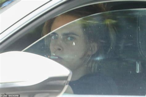 Cara Delevingne Looks Out Of Sorts While Smoking And Taking Drops Of An