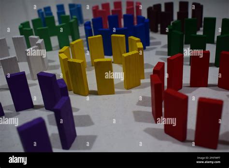 Colorful Wooden Dominoes In Circular Shapes On A White Background Stock