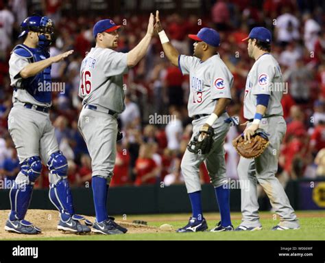 Chicago Cubs L To R Michael Barrett Ryan Dempster Neifi Perez And Todd Walker Celebrate A 14