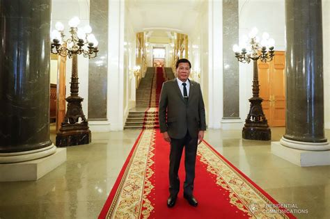 President Rodrigo Roa Duterte Strikes His Signature Pose As He Is Given