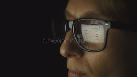 A Female Face In Glasses With The Reflection Of A Monitor With An Internet Search Stock Footage