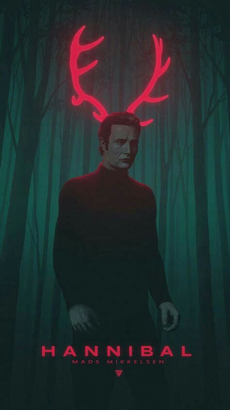 A Man Standing In Front Of A Forest With Antlers On It S Head