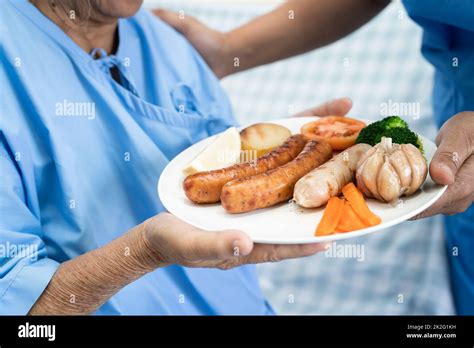 Asian Senior Or Elderly Old Lady Woman Patient Eating Breakfast Healthy
