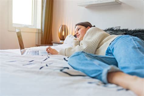 Nice Teenage Girl Using A Computer In Her Bedroom Stock Image Image