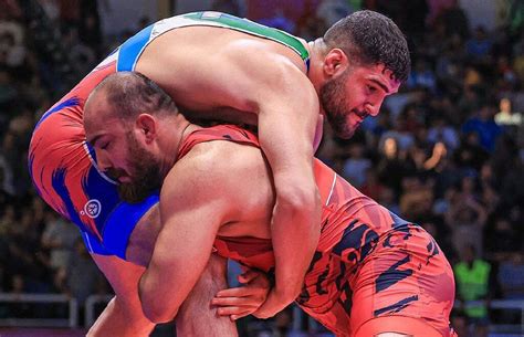 اولین تصاویر از تمرینات قهرمان کشتی ایران پس از مهاجرت همشهری آنلاین