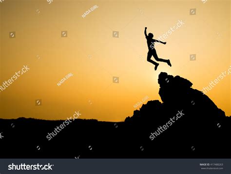 Man Jump Through Gap Between Hill Stock Photo 417488263 Shutterstock