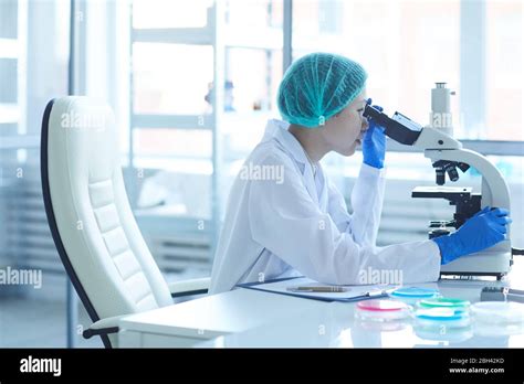 Asian Lab Technician On Microscope Hi Res Stock Photography And Images Alamy