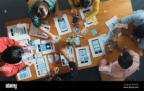 Top View Of Developer And Designer Shake Hand Together At Meeting