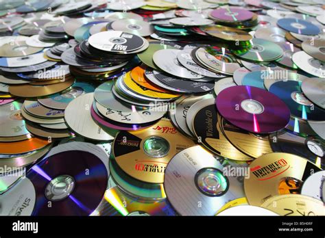 Heap Of CDs And DVDs Stock Photo Alamy
