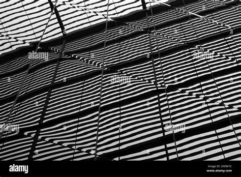 Low Angle Perspective View Of Abstract Mirrored Glass Facade