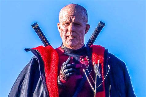 Ryan Reynolds Steps Out In Deadpool” Scar Makeup And Red Suit To Film