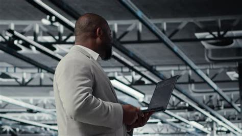 Admin Walking In Data Center Industrial Platform Analyzing Performance Technology Stock Footage