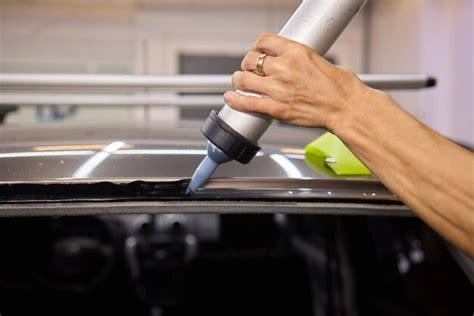 Premium Photo Use Professional Adhesive When Repairing Windshield