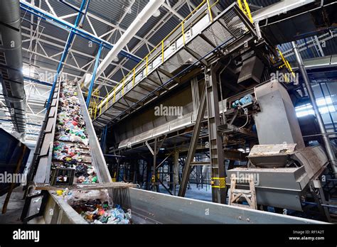 Wide Angle View At Recycling Plant Conveyor Belt Transports Garbage