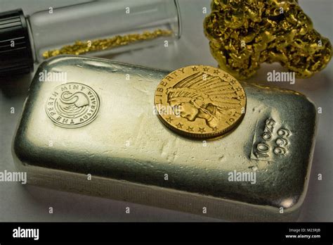 Ounce Silver Bar Gold Indian Coin And Raw Gold Nuggets Stock Photo Alamy