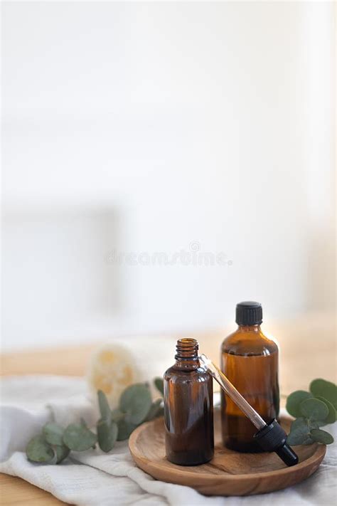 Essential Oils In Glass Dark Bottle Skin And Body Care Treatment