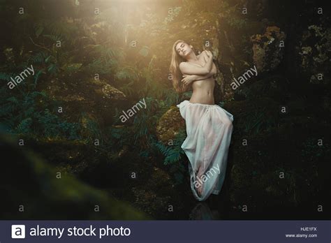 Beautiful Forest Nymph Among Ferns Fantasy And Romantic Stock Photo Alamy
