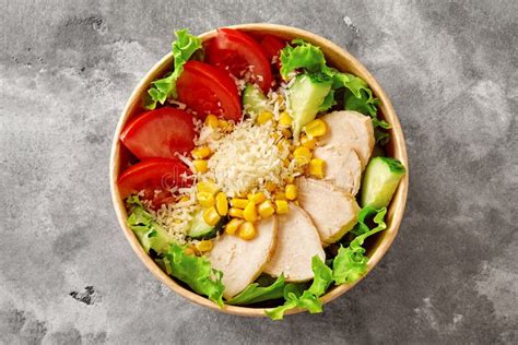 Paper Bowl Of Salad With Lettuce Tomatoes Cucumbers Chicken Fillet