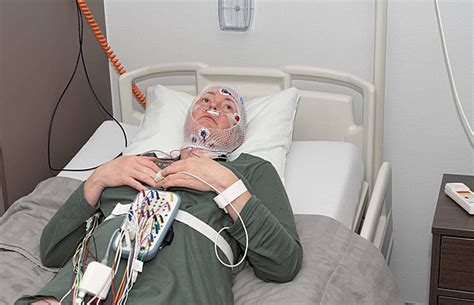 Brain Wave Measurements And Polysomnography Exam By A Middleaged Woman