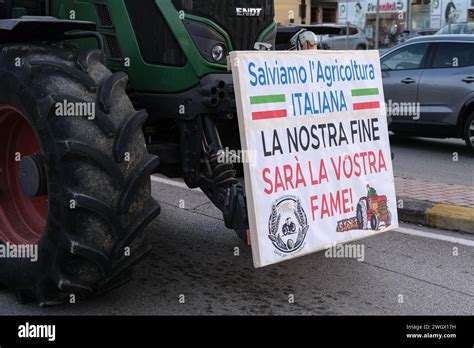 The Sign On The Tractor Says We Save Italian Agriculture Our End